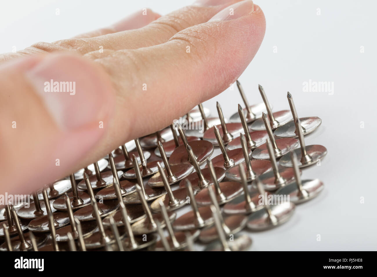 Group Of Metal Thumb Tacks for background Stock Photo - Alamy