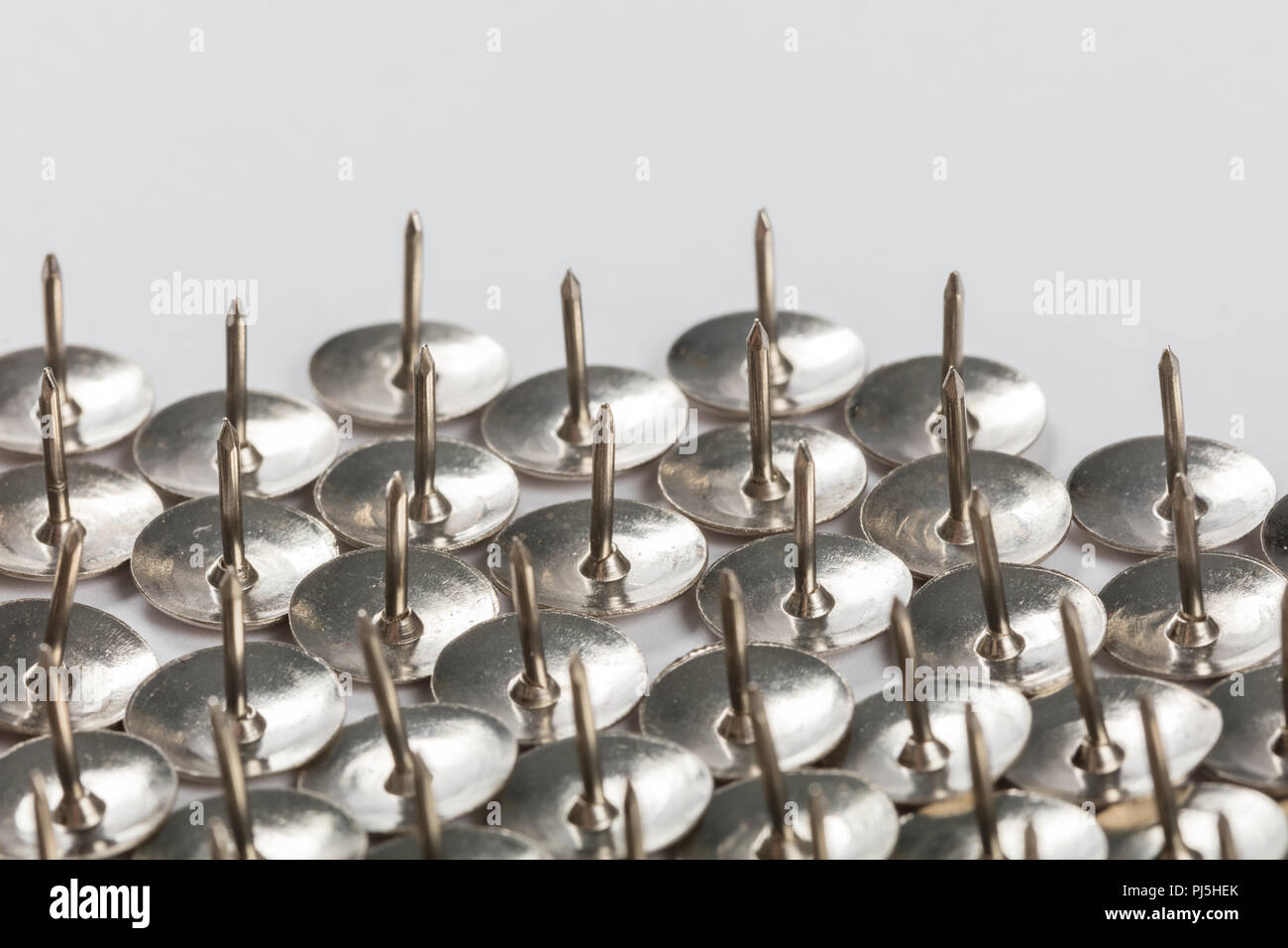 Group Of Metal Thumb Tacks for background Stock Photo - Alamy