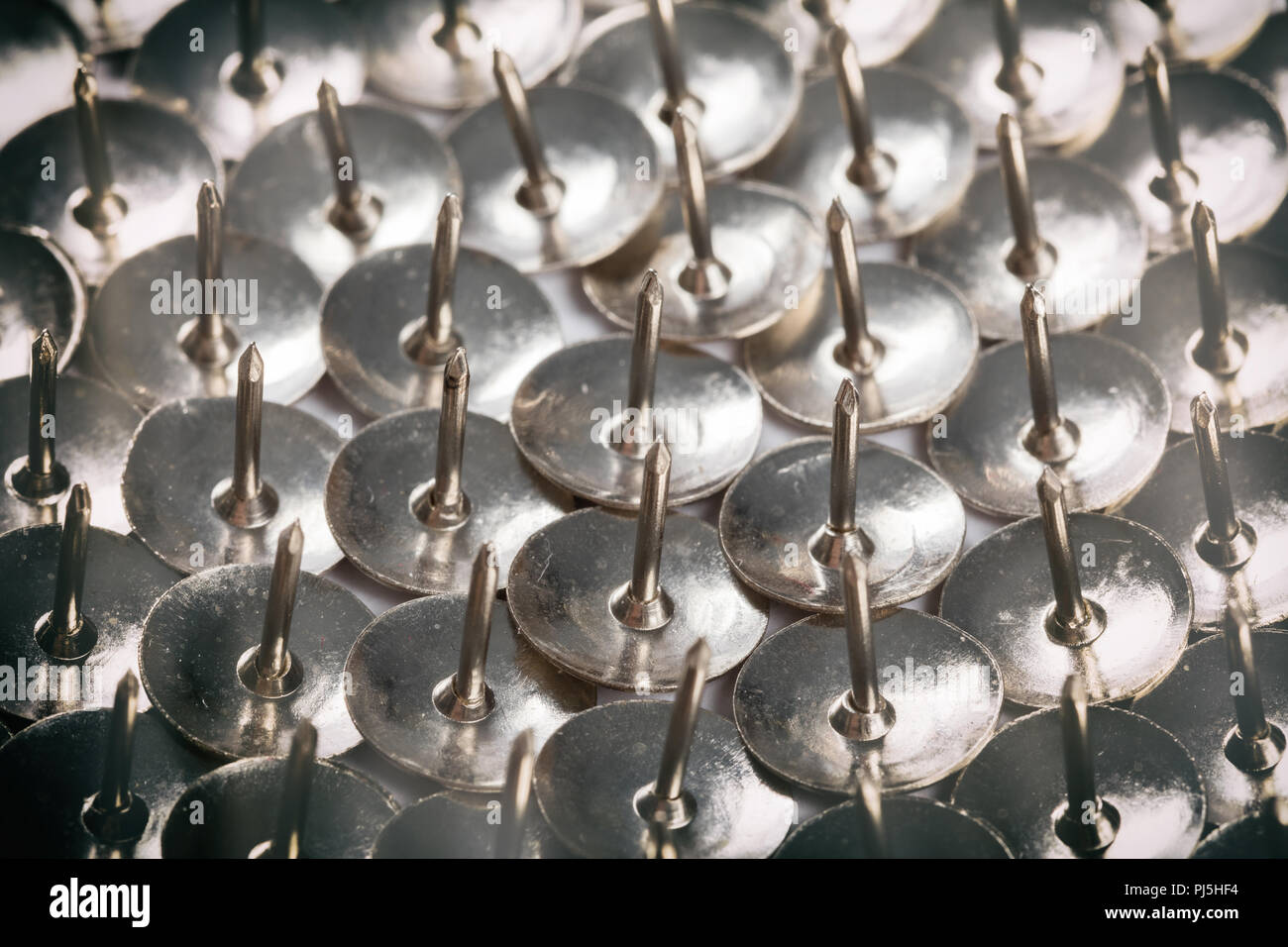 Group Of Metal Thumb Tacks for background Stock Photo - Alamy