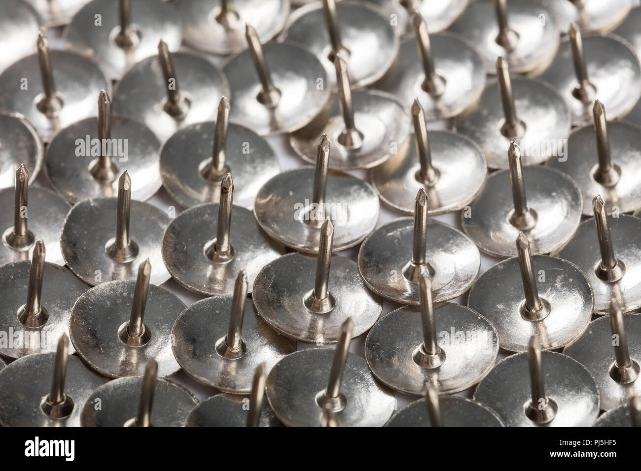 Group Of Metal Thumb Tacks for background Stock Photo - Alamy