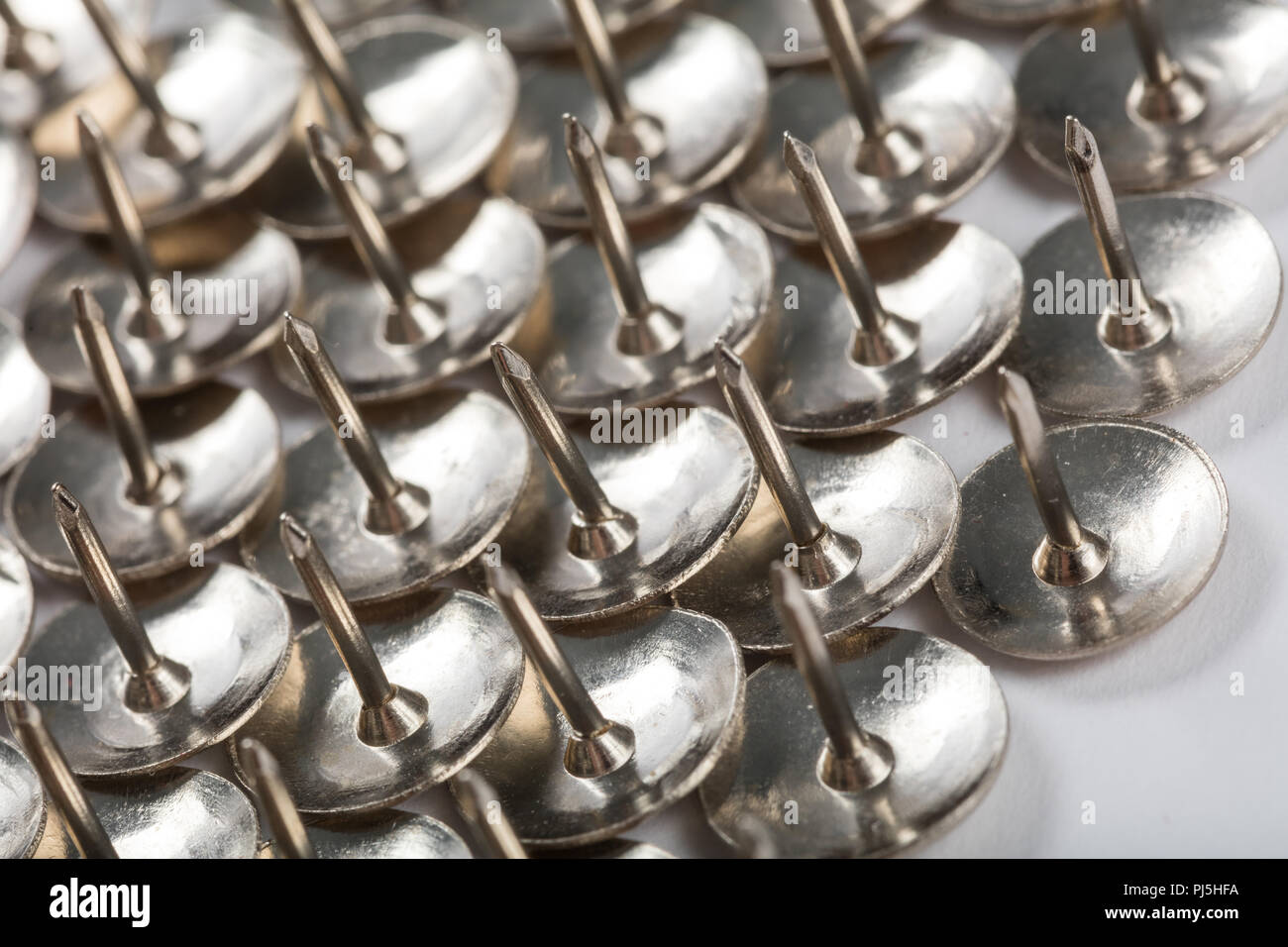 Group Of Metal Thumb Tacks for background Stock Photo - Alamy