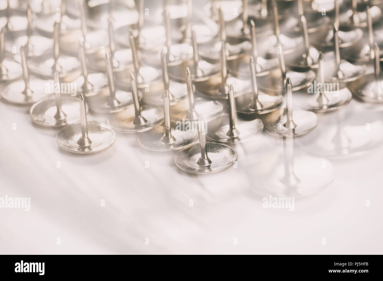 Group Of Metal Thumb Tacks for background Stock Photo - Alamy