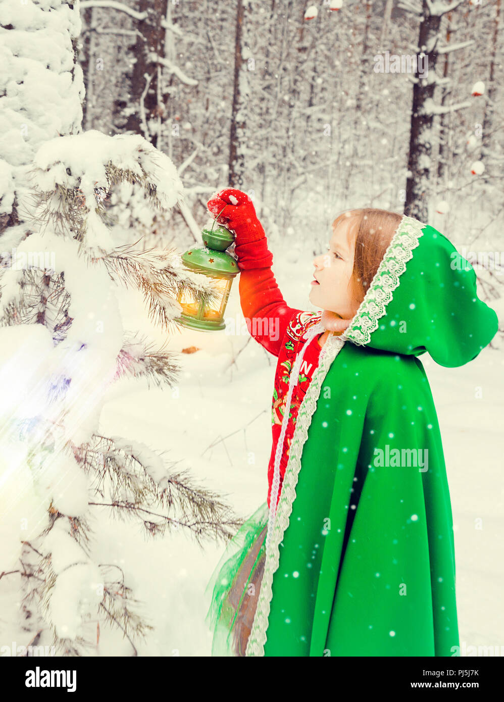 a red-haired girl with long hair in a lush skirt and a green cloak with ...