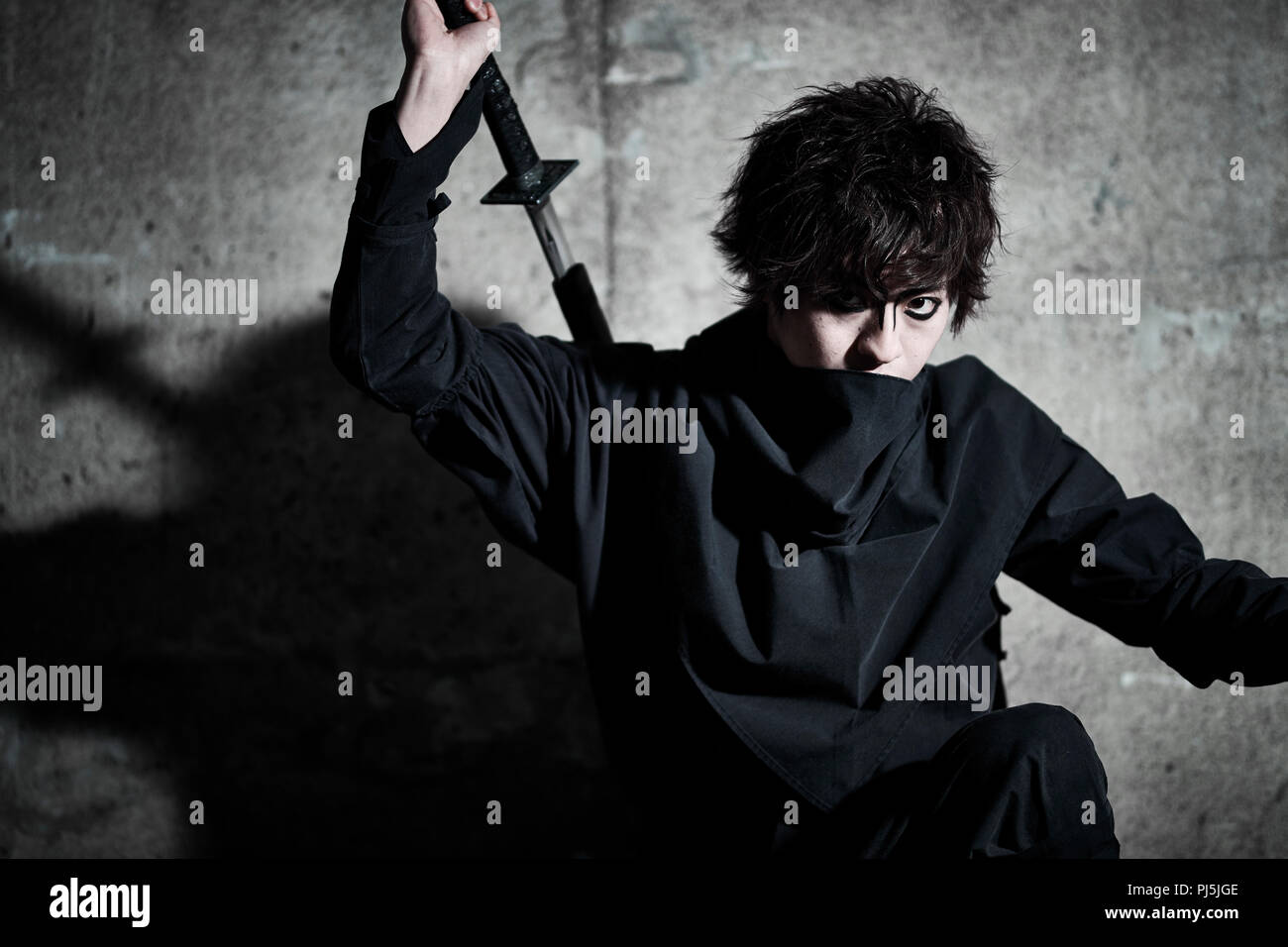 Japanese ninja at night downtown Tokyo Stock Photo - Alamy