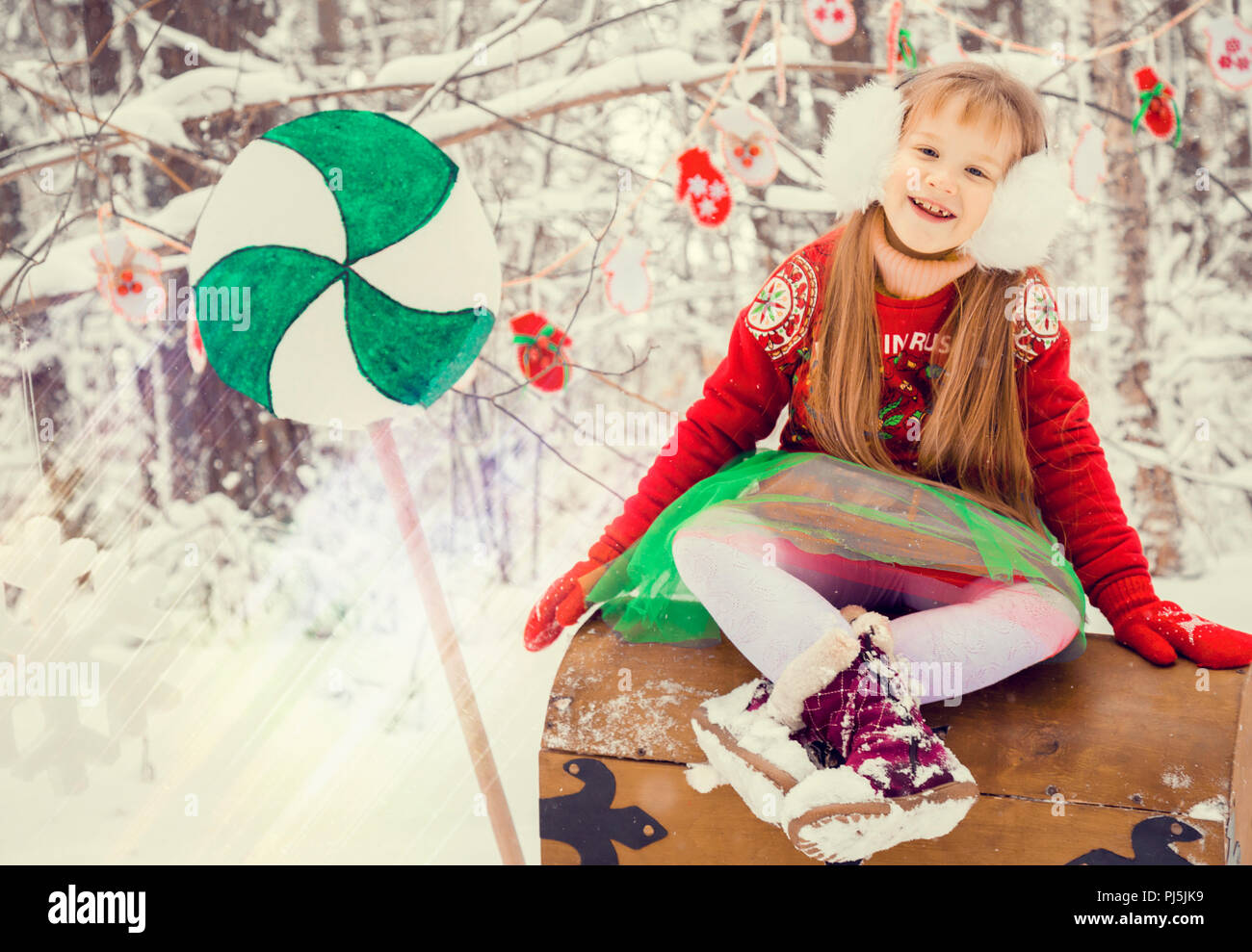 A Little Red Haired Girl With Long Hair In A Lush Skirt And A Green 8781
