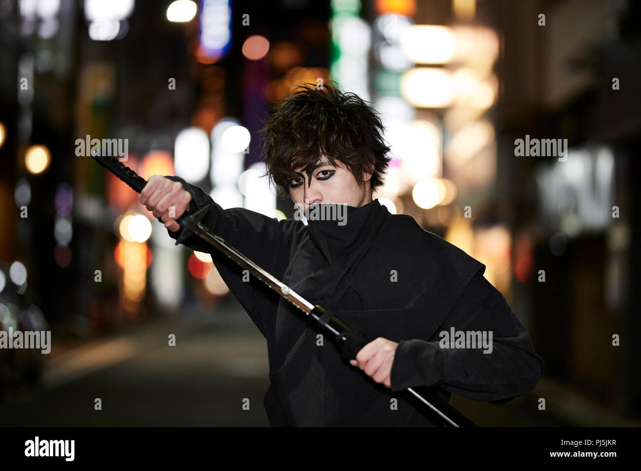 Japanese ninja at night downtown Tokyo Stock Photo - Alamy