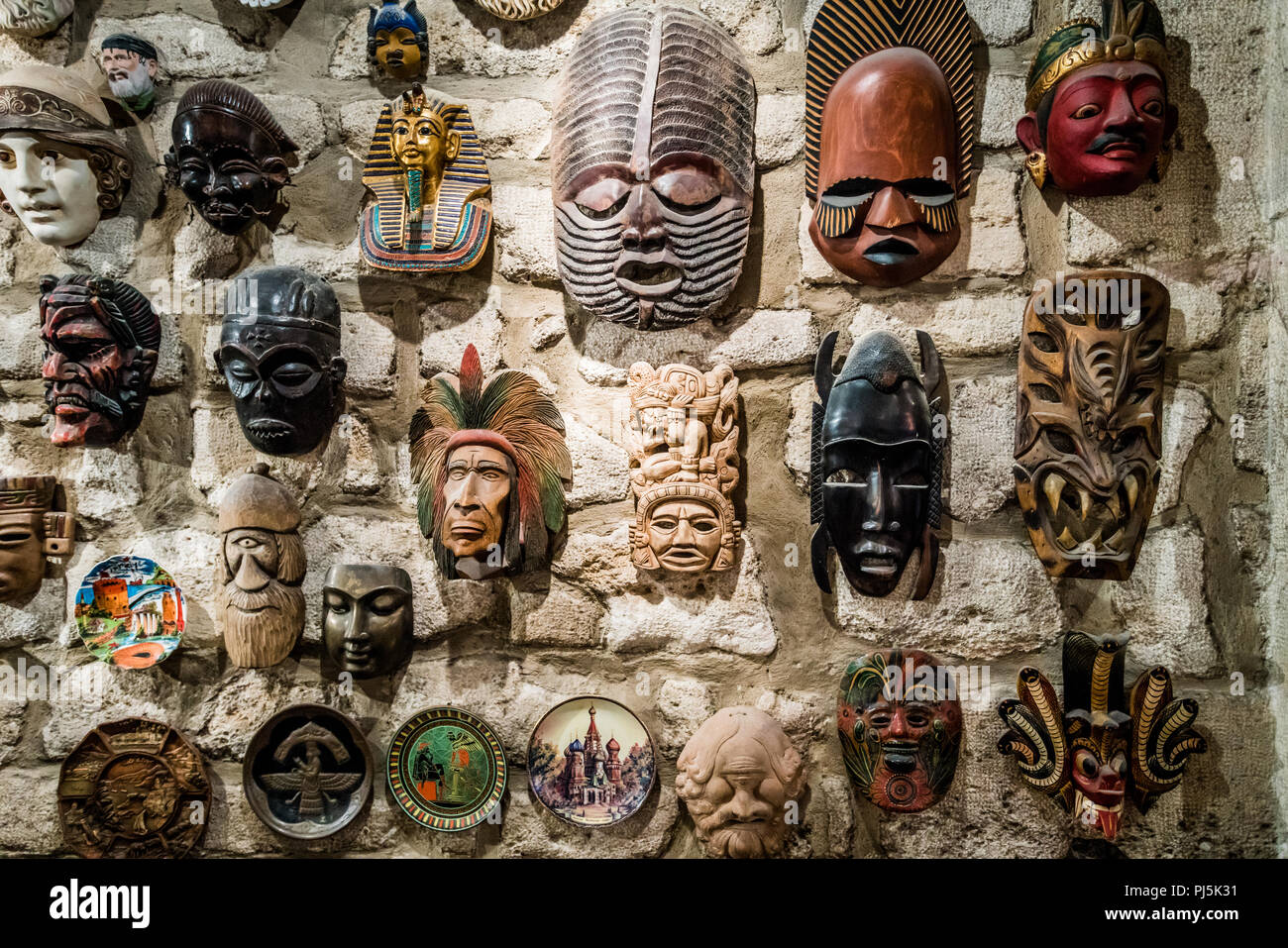 African masks on wall hi-res stock photography and images - Alamy