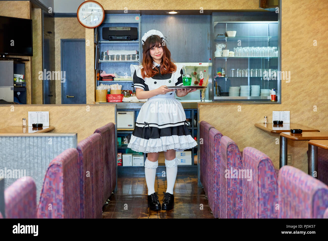 Maid carrying tray hi-res stock photography and images - Alamy