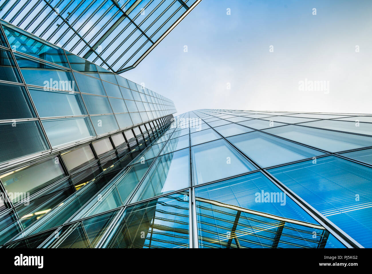 steel blue glass high rise building skyscrapers Stock Photo - Alamy