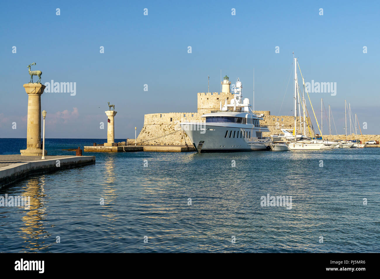 The Mandraki Habour, Rhodes Greece Stock Photo - Alamy