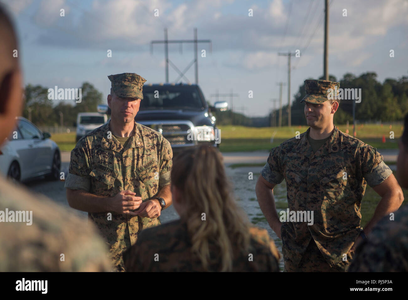 U.S. Marine Corps Maj. Brady Bustin, a psychological operations officer ...