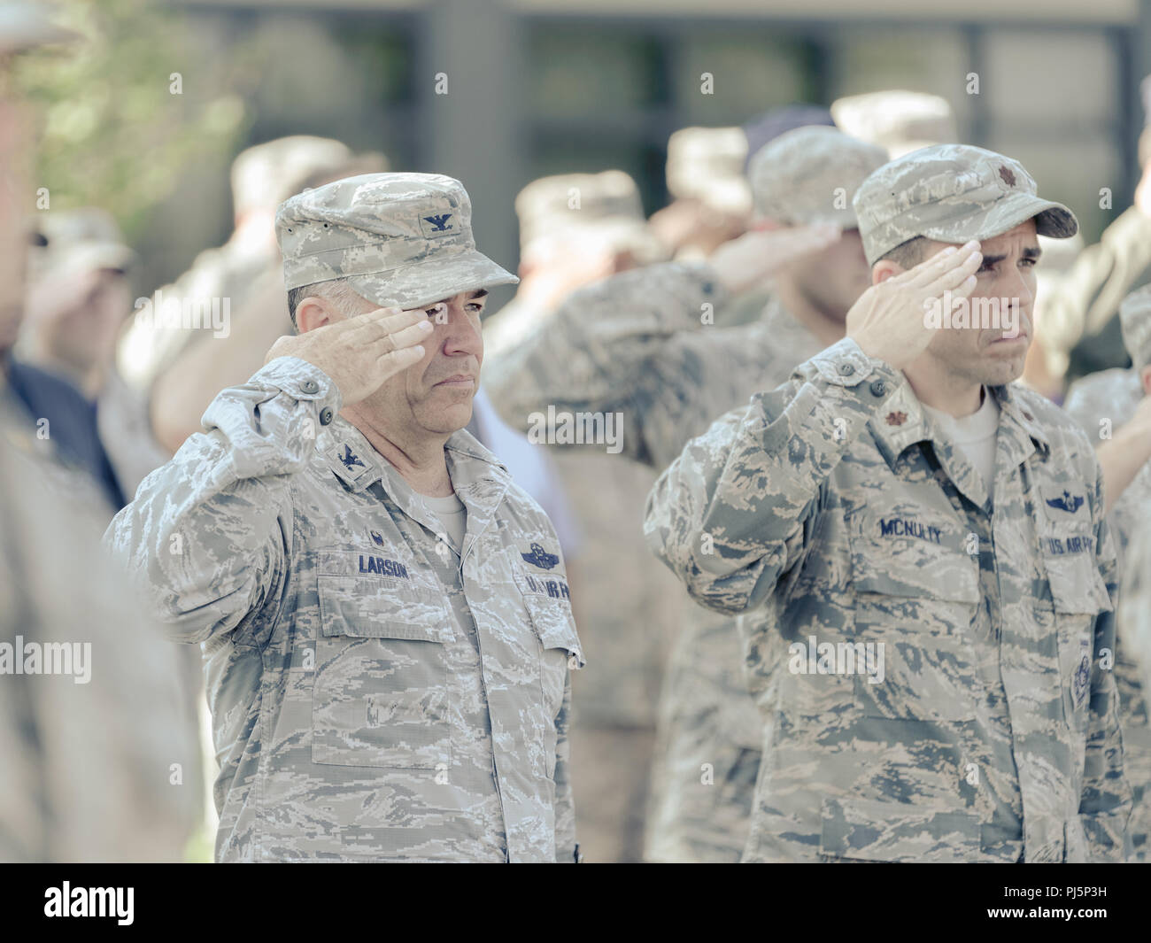 Col. Mark Larson, commander of the 914th Air Refueling Wing, salutes as ...