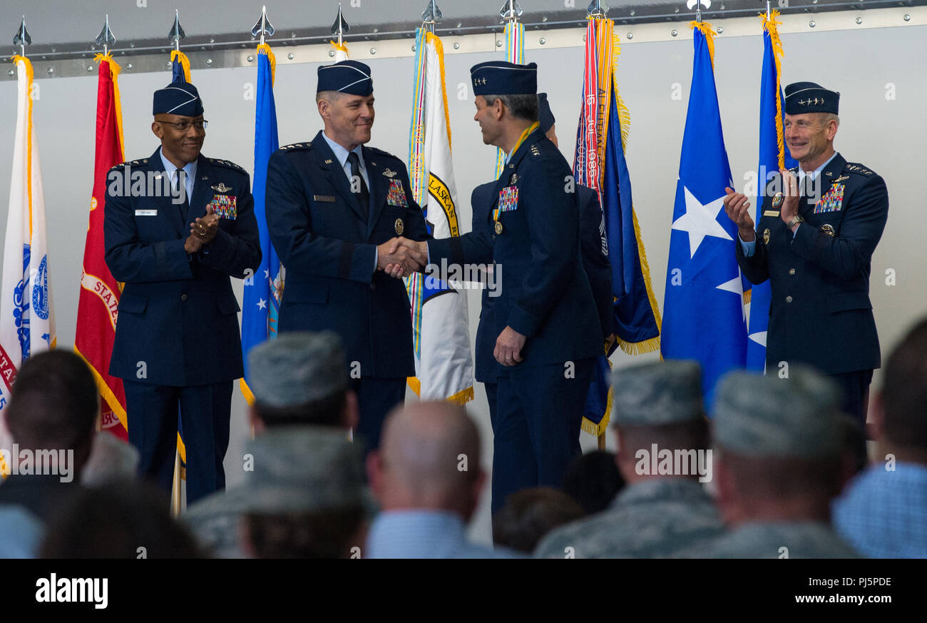 U.S. Air Force Lt. Gen. Tom Bussiere shakes hands with U.S. Air Force ...