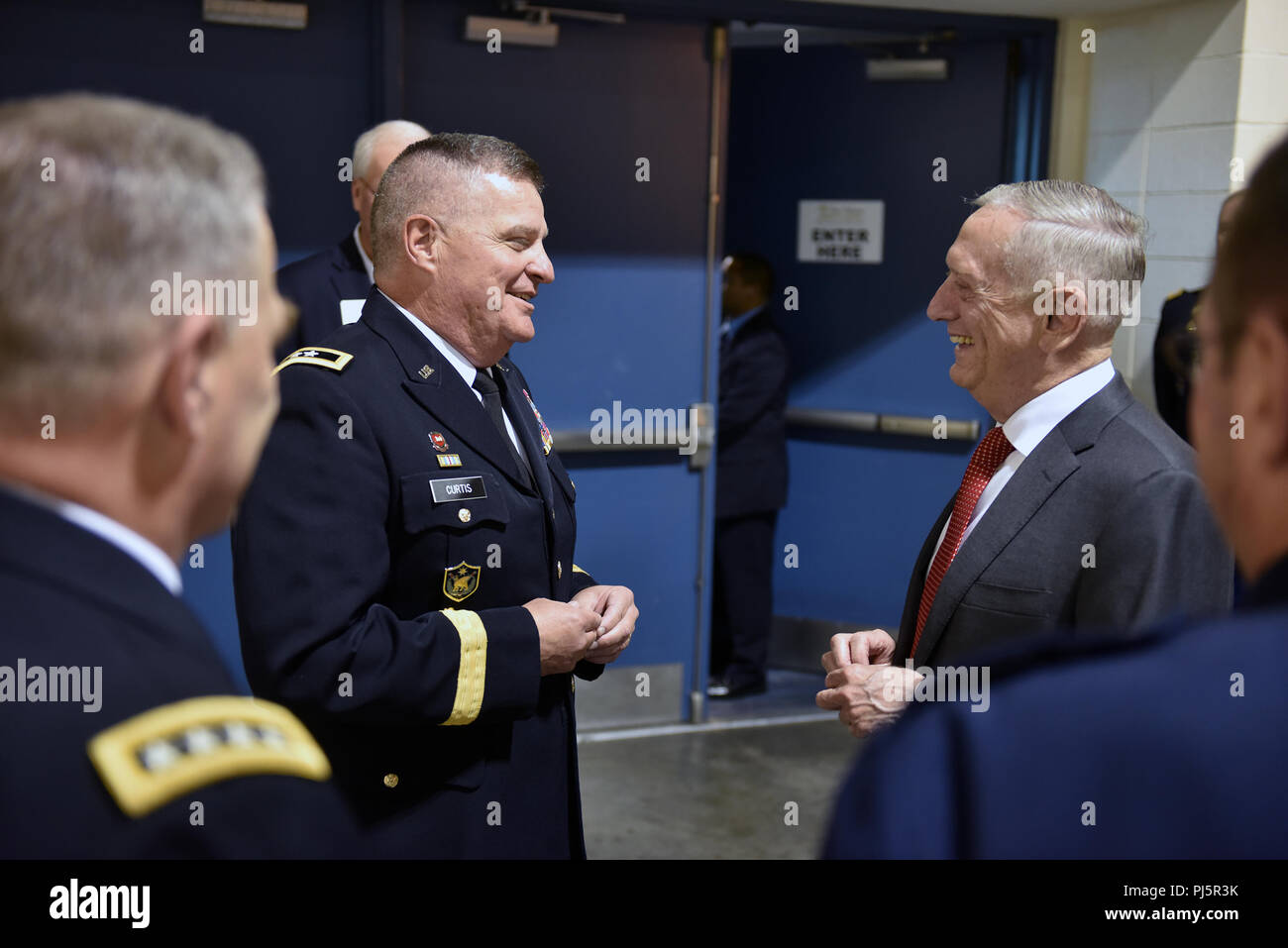 Secretary of Defense James Mattis talks with Army Maj. Gen. Glenn ...