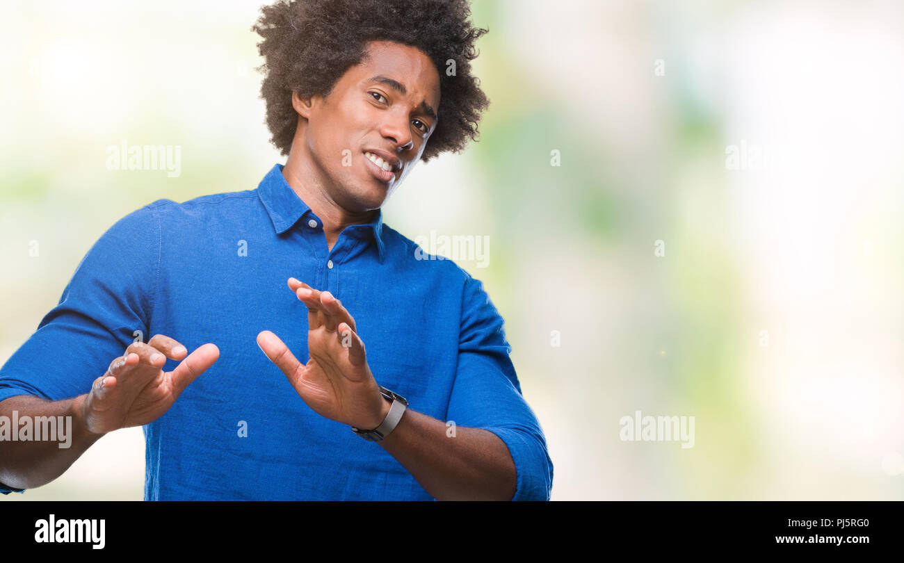 Afro american man over isolated background disgusted expression ...