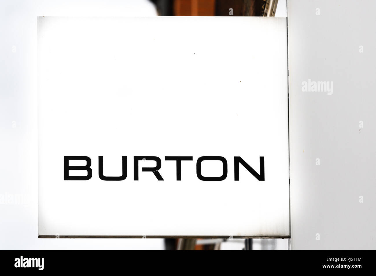 Sign outside the Burton shop in the High Street at the town centre of ...