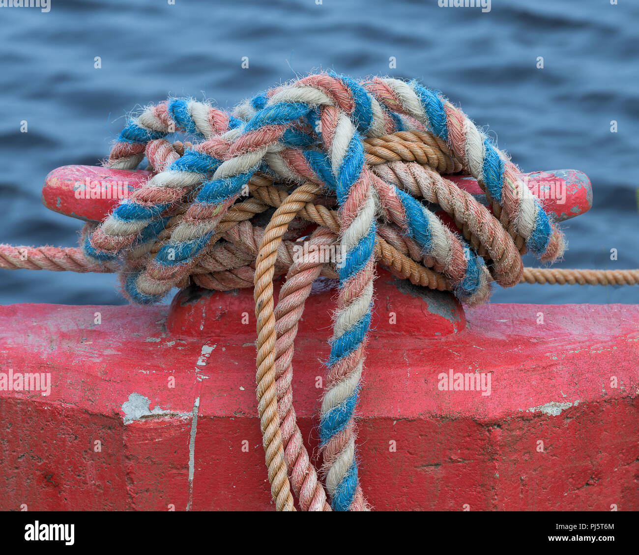 Red, white and blue rope in a knot at the harbor in Branch ...
