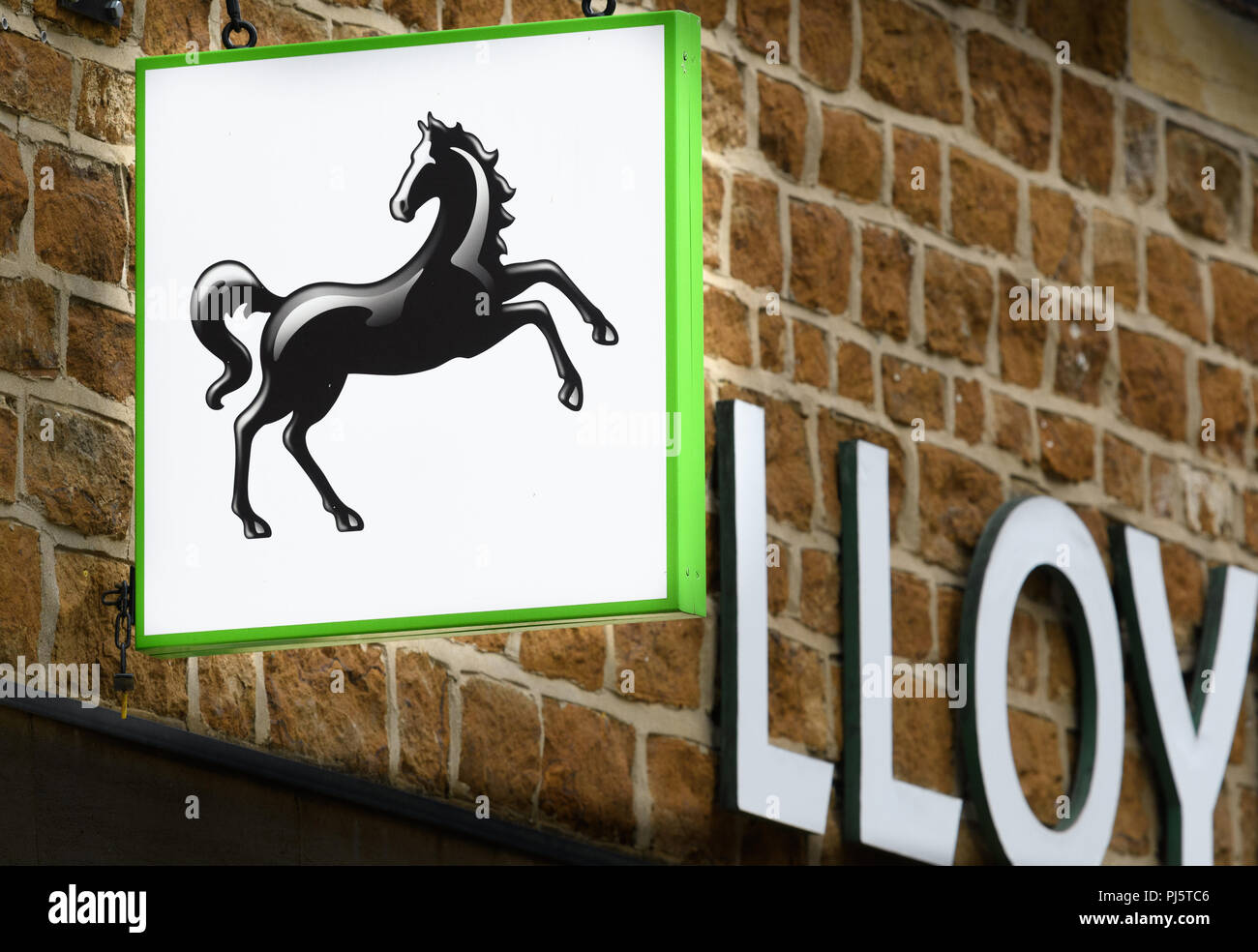 Sign on the wall outside the Lloyds bank building in Market Street at ...