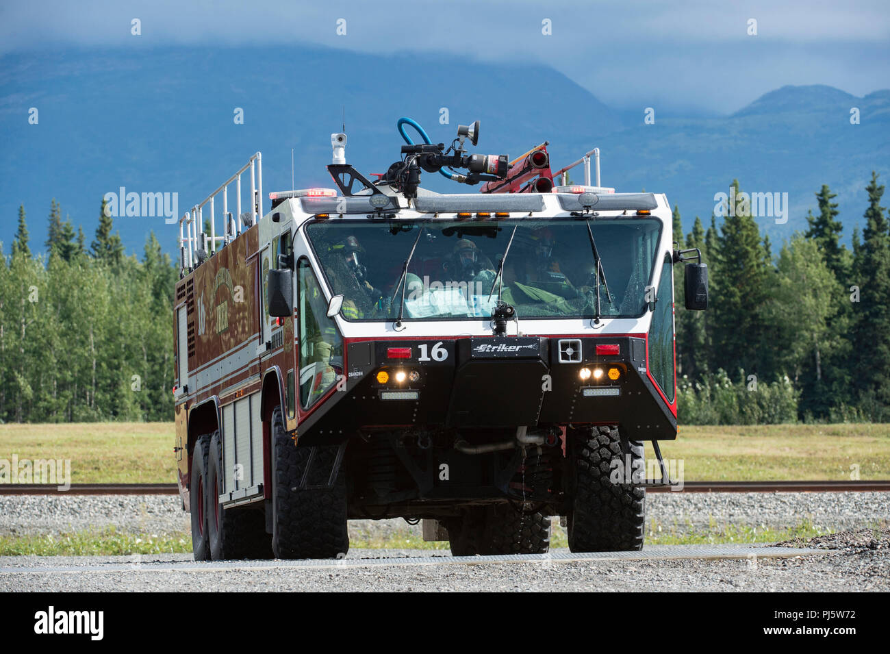 U.S. Air Force fire protection specialists assigned to the 673d Civil ...