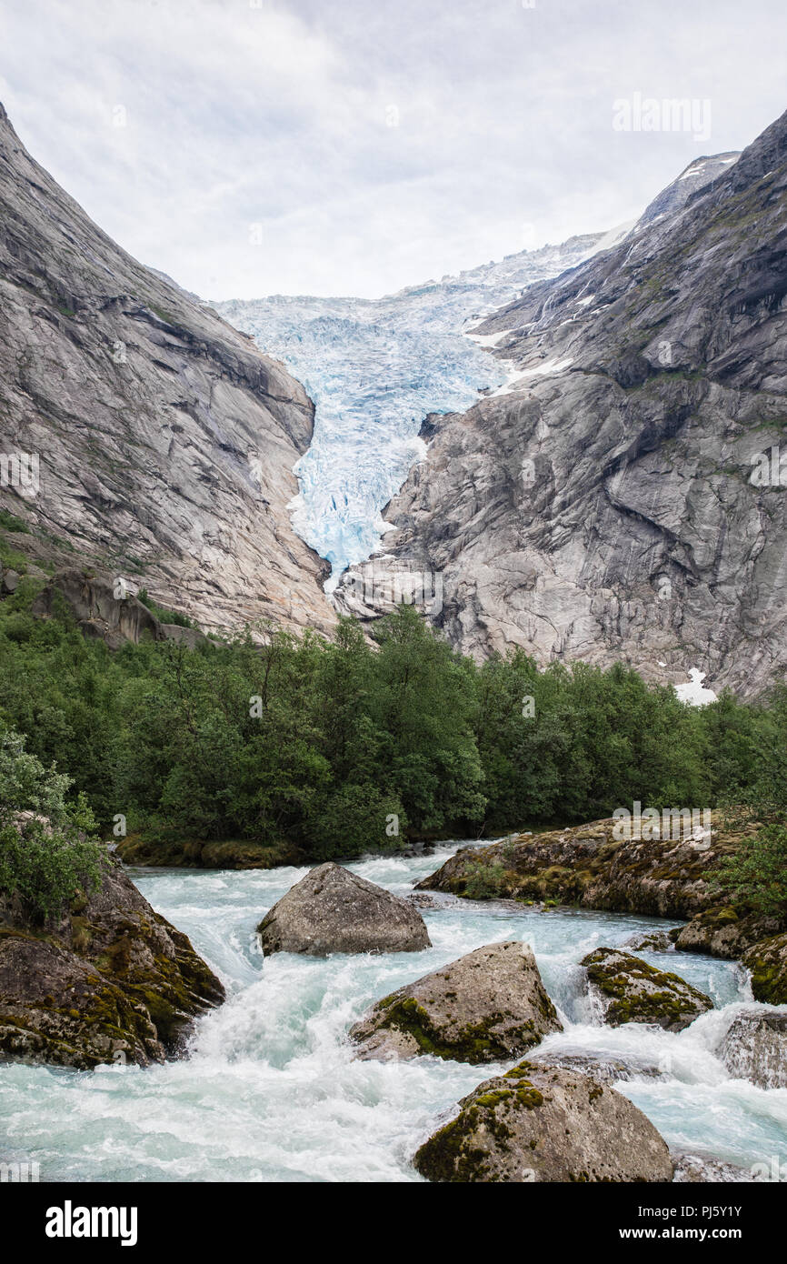 Briksdal glacier with melt water in Jostedalsbreen National Park ...