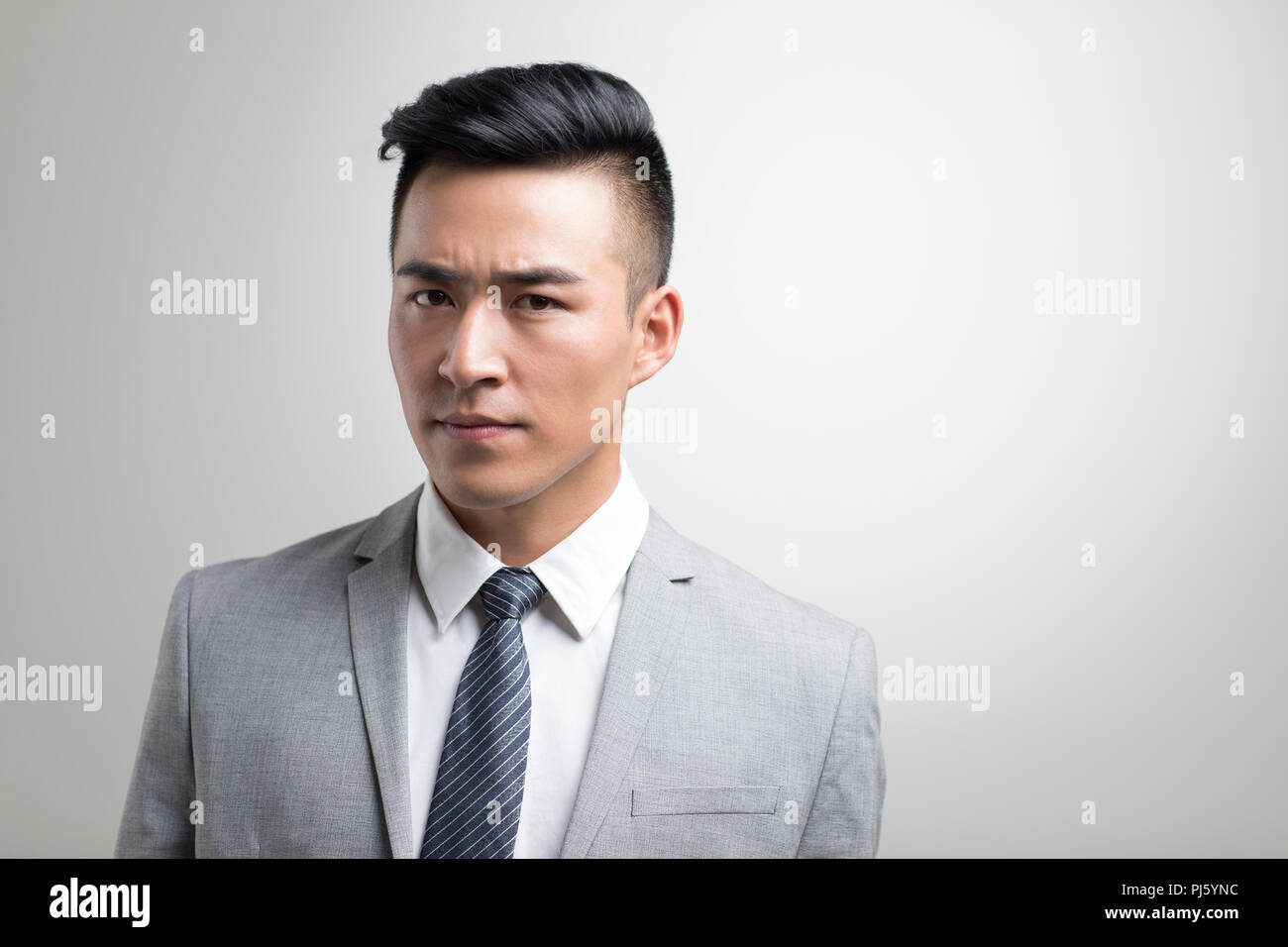 Businessman frowning hi-res stock photography and images - Alamy