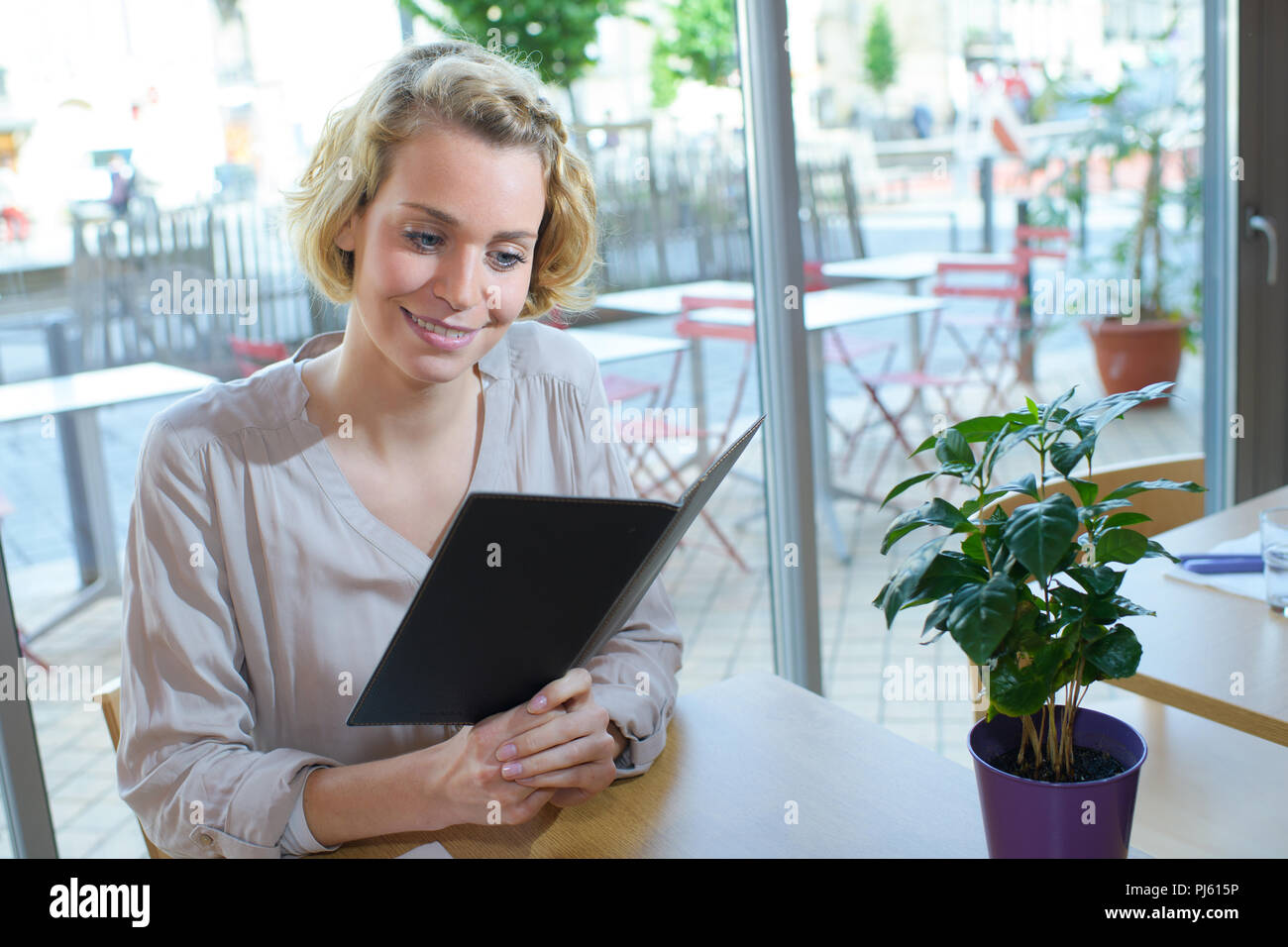 customer reading the menu Stock Photo - Alamy