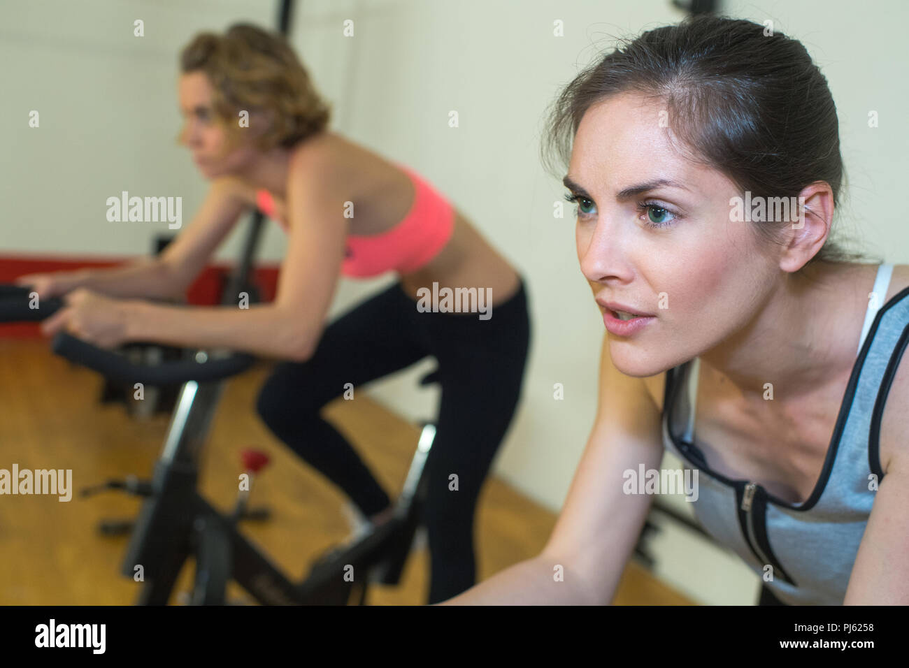 two girls in fitness club Stock Photo - Alamy