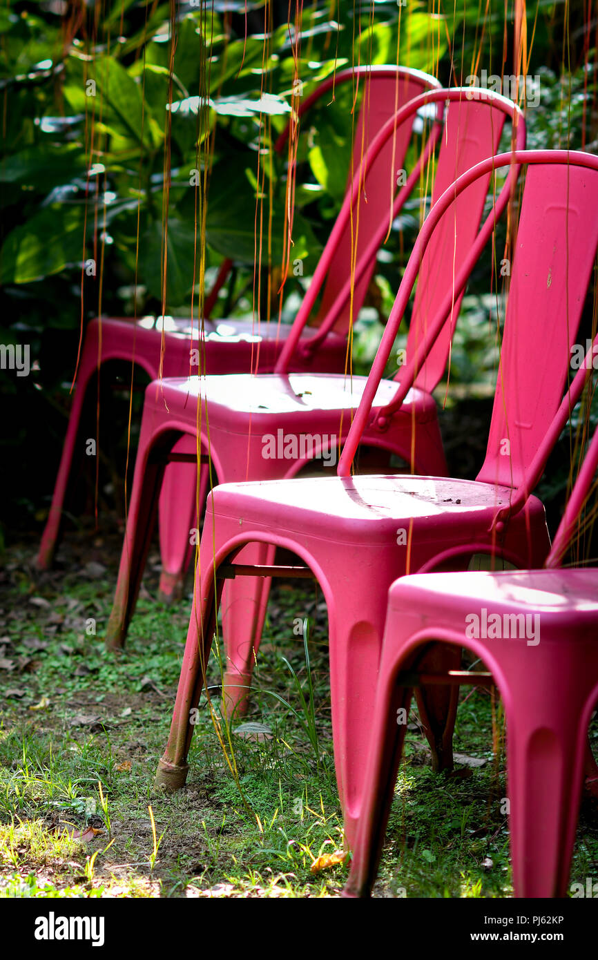 pink metal chair outdoor Stock Photo - Alamy