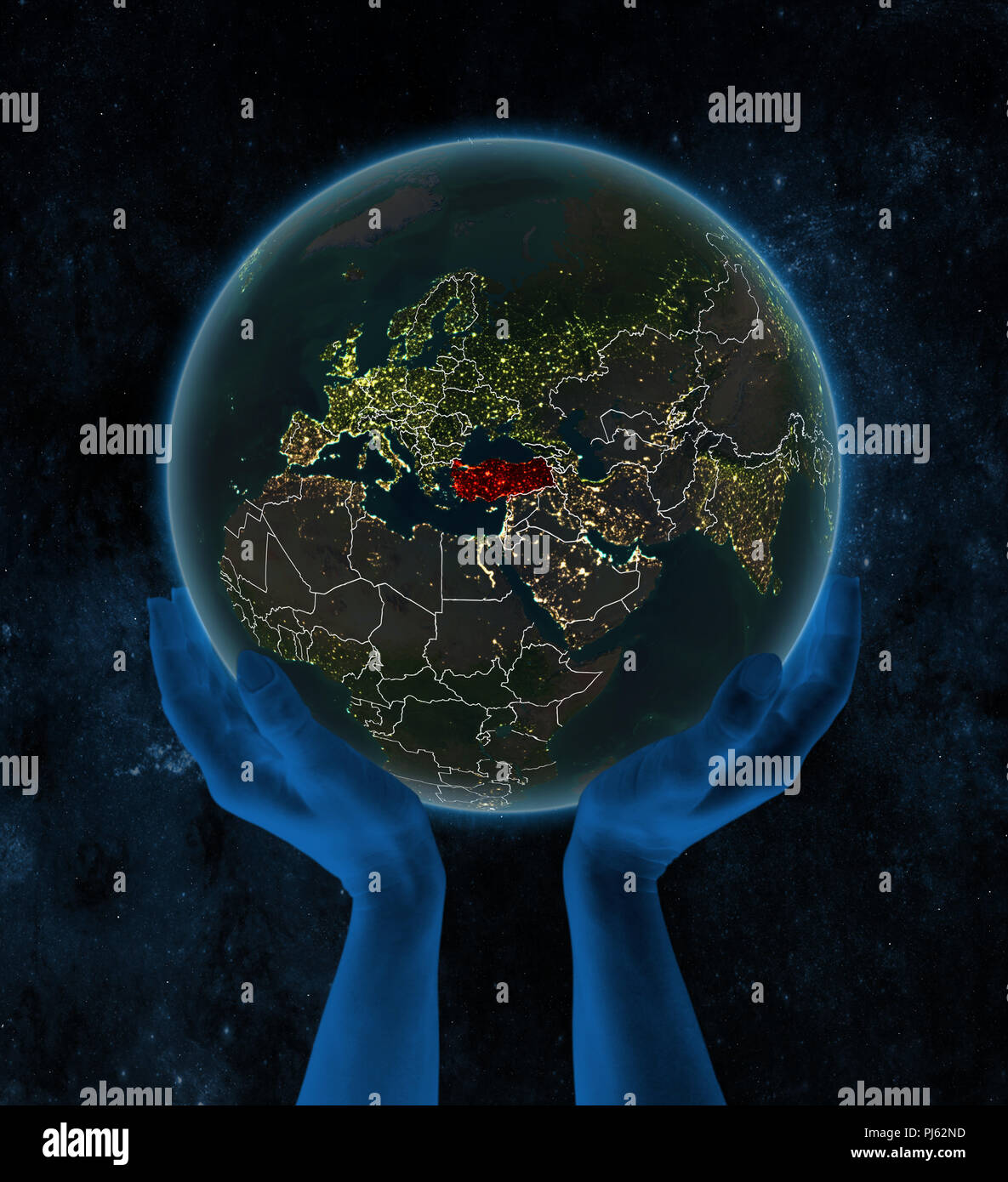 Turkey on night planet Earth with visible country borders in hands in ...