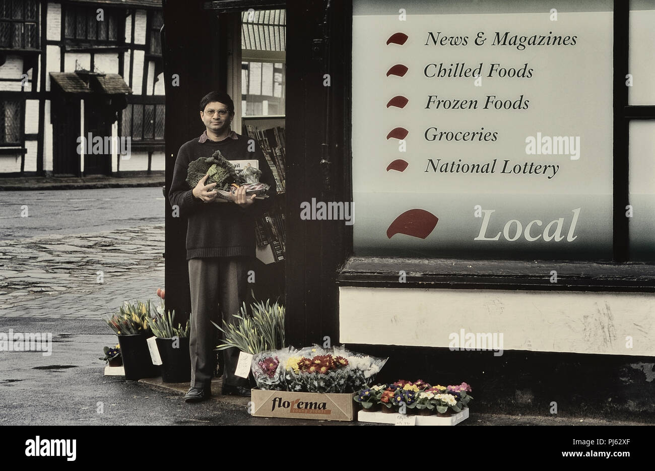 Asian shopkeeper uk hi-res stock photography and images - Alamy