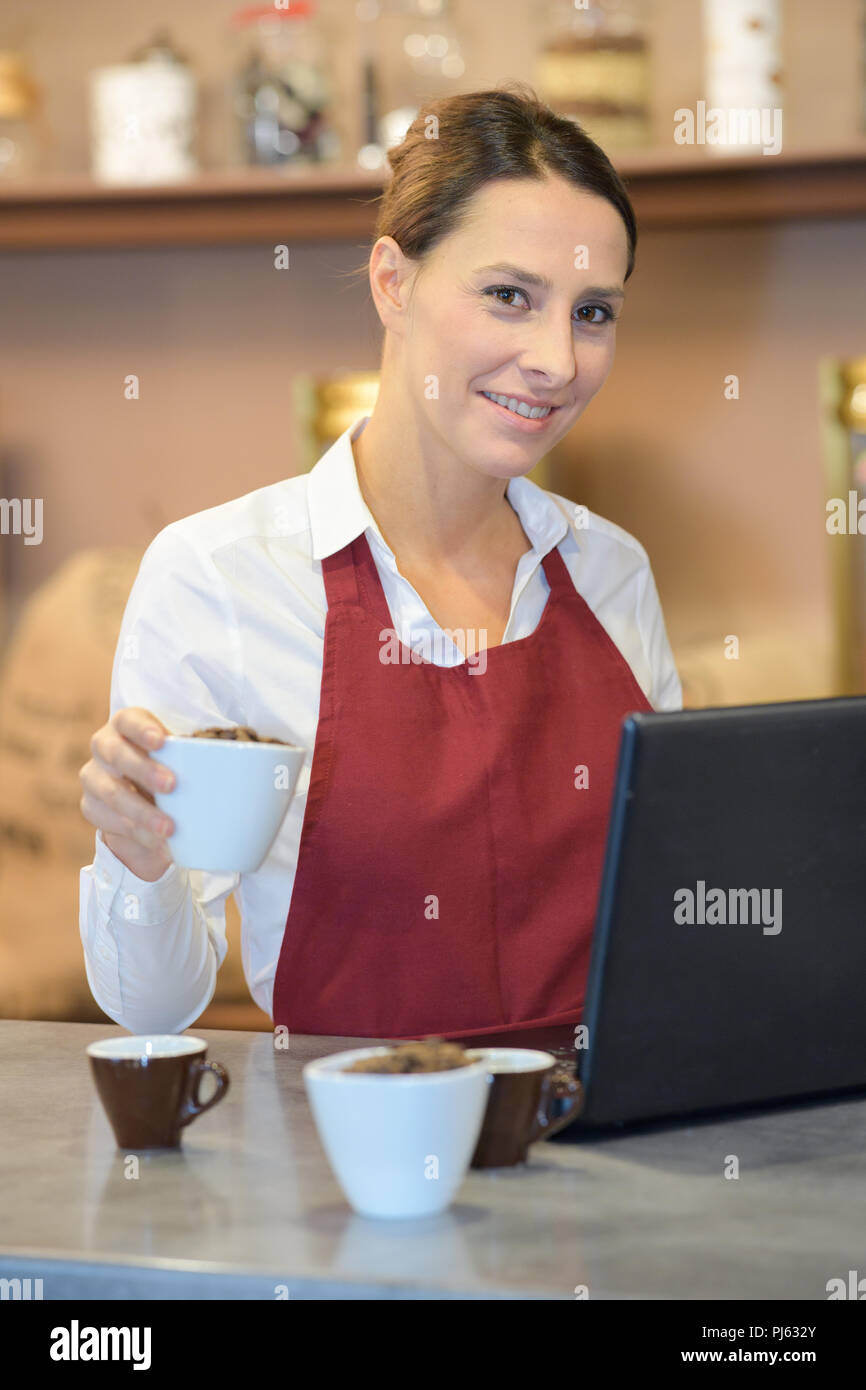 Closeup coffee shop employee serving hi-res stock photography and ...