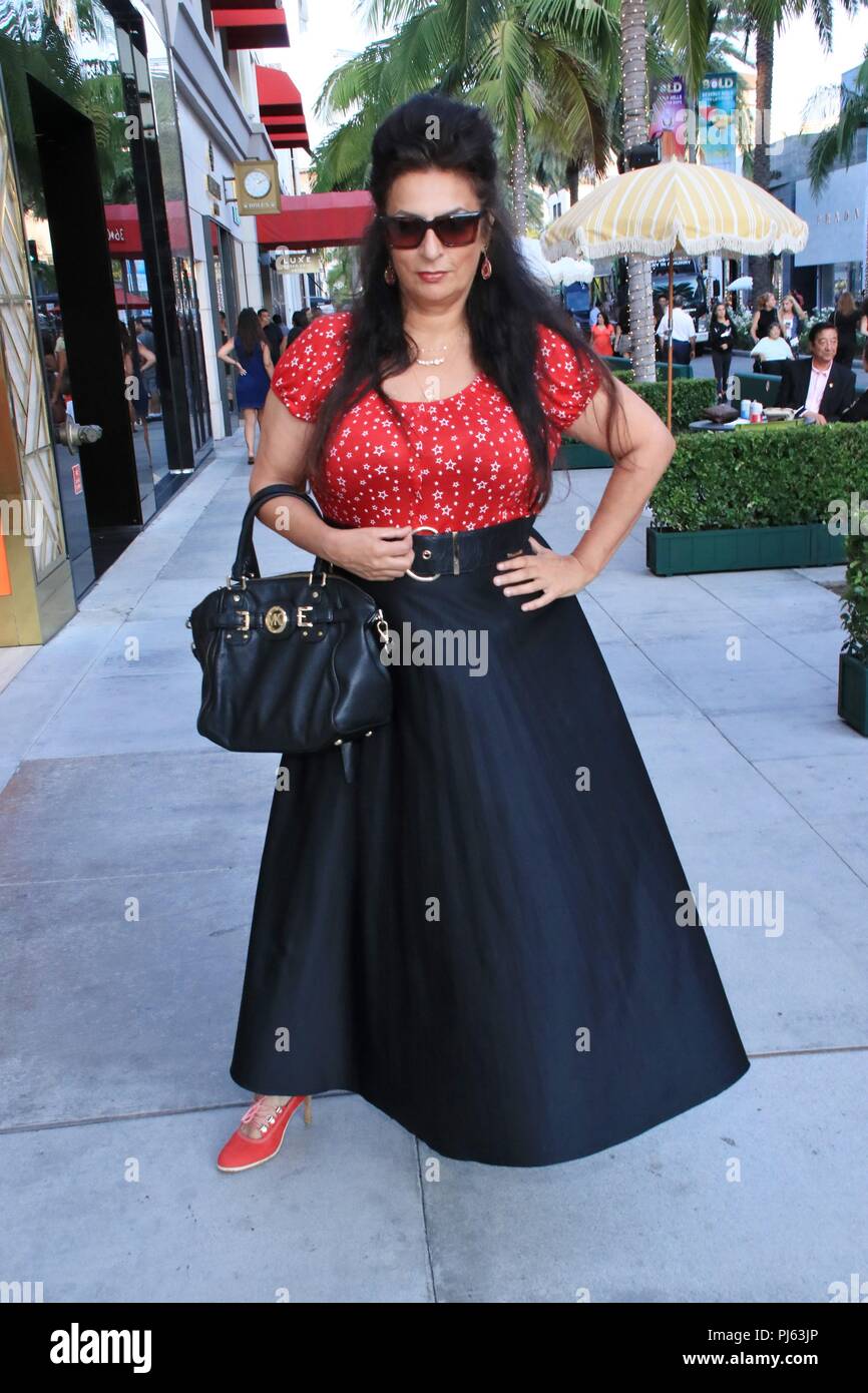 Alice Amter poses for a photoshoot at Rodeo Drive's 100 Year ...