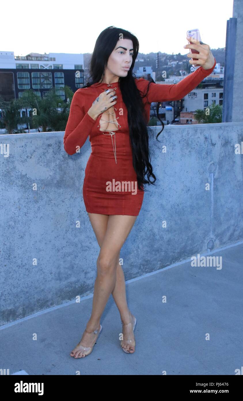 Melissa Howe poses for a photoshoot during sunrise in Hollywood ...