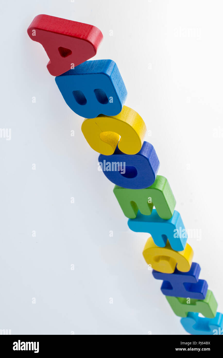 Letter cubes of Alphabet made of wood Stock Photo - Alamy