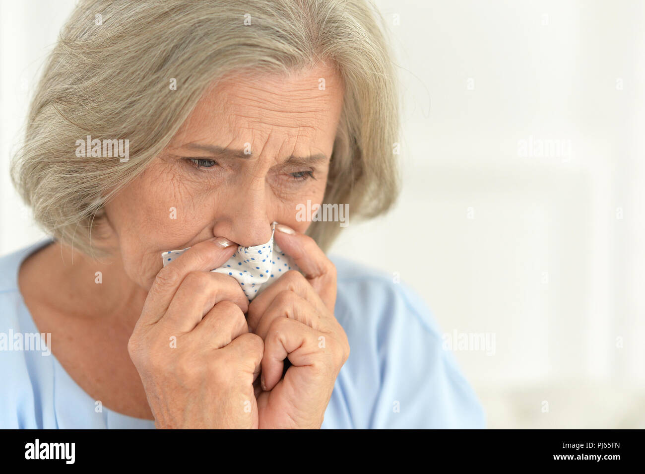 close-up portrait of stressed senior woman at home Stock Photo - Alamy