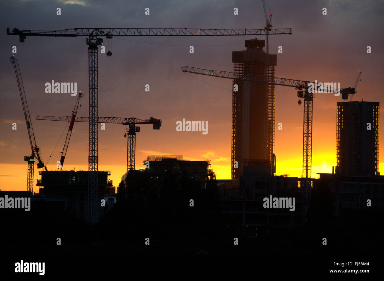 Manchester, UK. 4 September, 2018. Sunset over the Manchester skyline ...