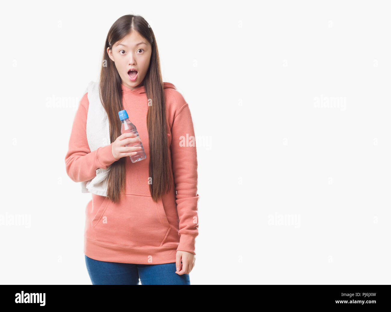 Young Chinese woman over isolated background wearing sport sweathshirt ...