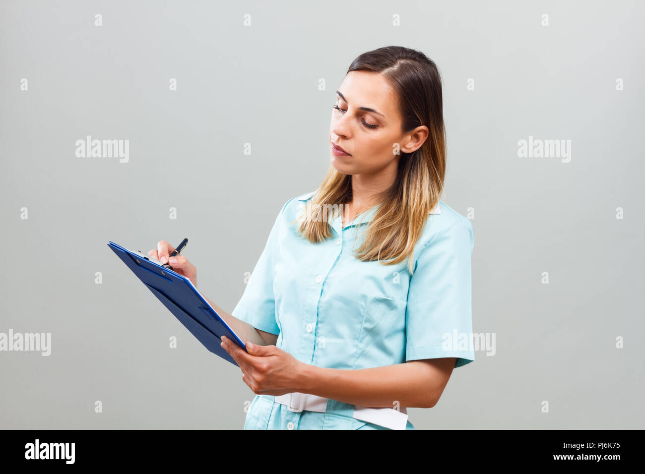 Nurse Writing Notes High Resolution Stock Photography and Images - Alamy