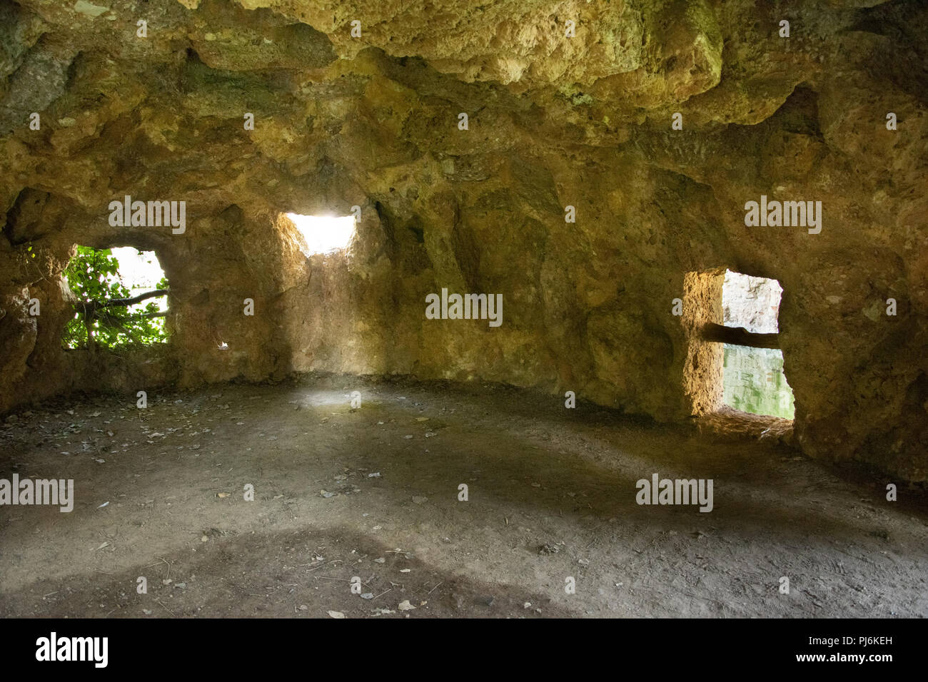Windows where light enters a cave Stock Photo - Alamy