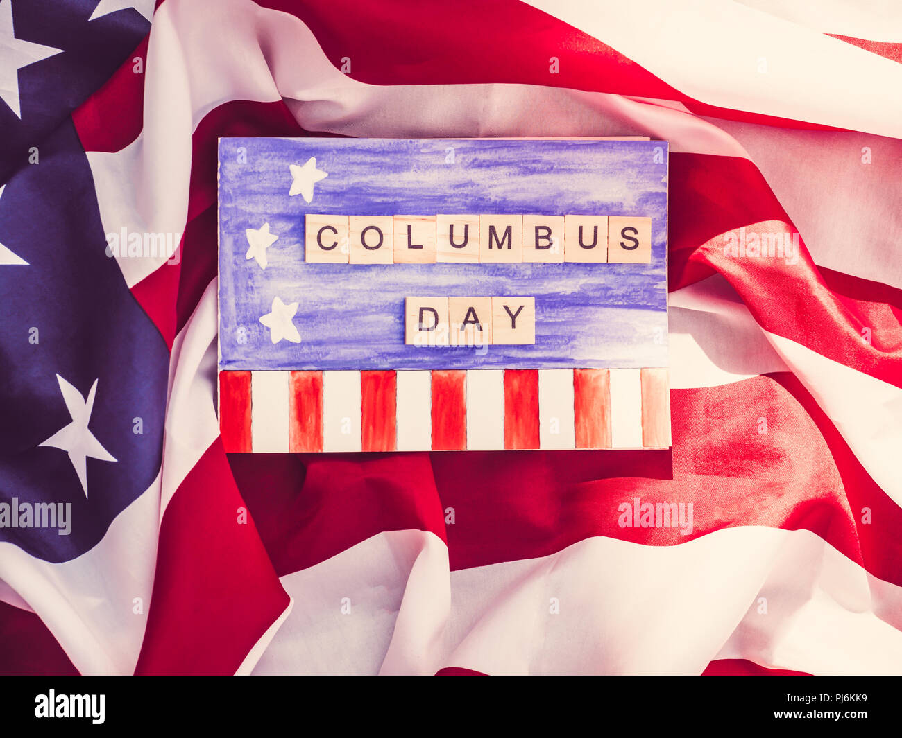 Notepad with blank page, wooden letters of the alphabet in the form of ...