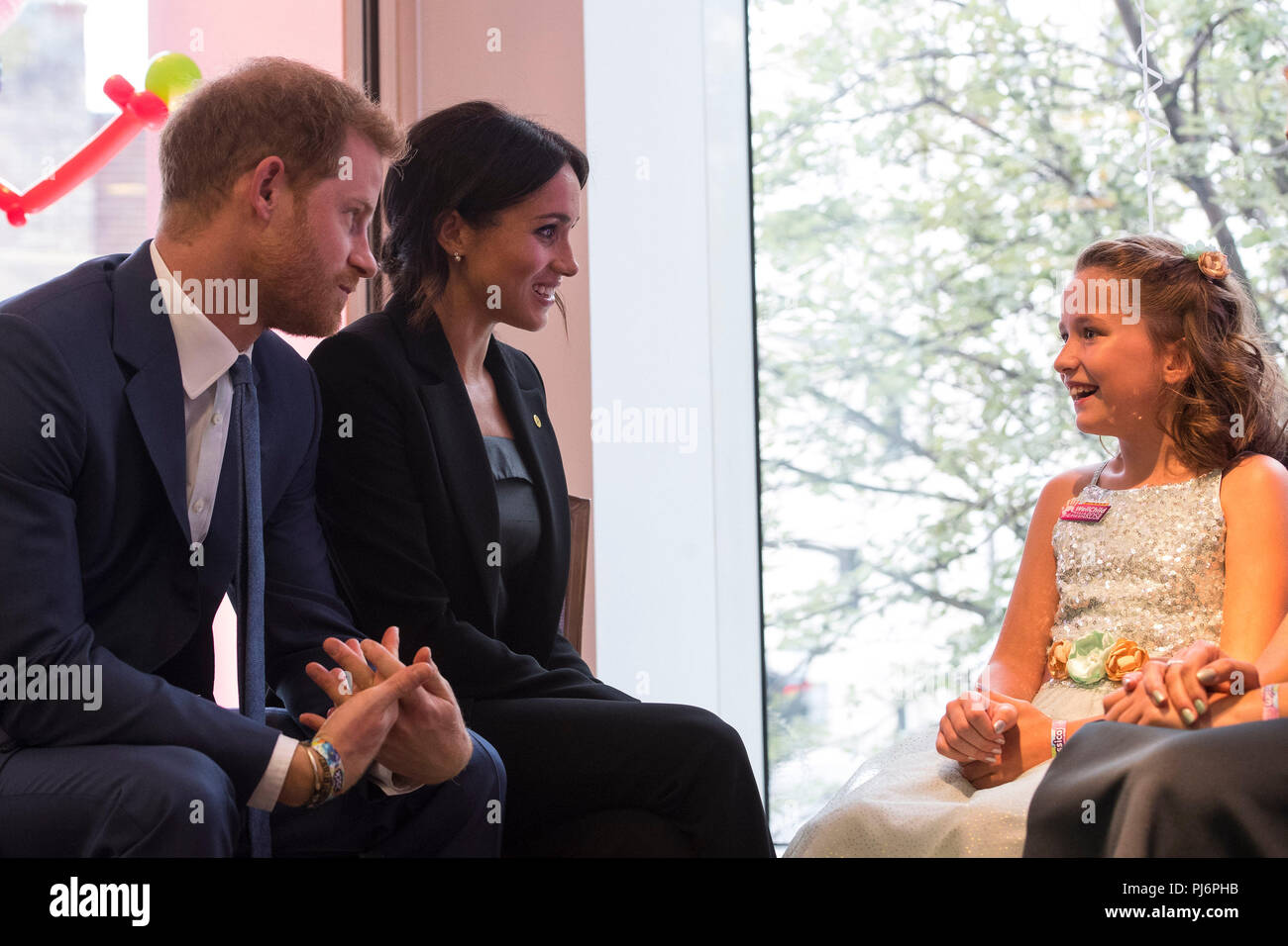 The Duke and Duchess of Sussex meet Chloe Henderson during the annual ...