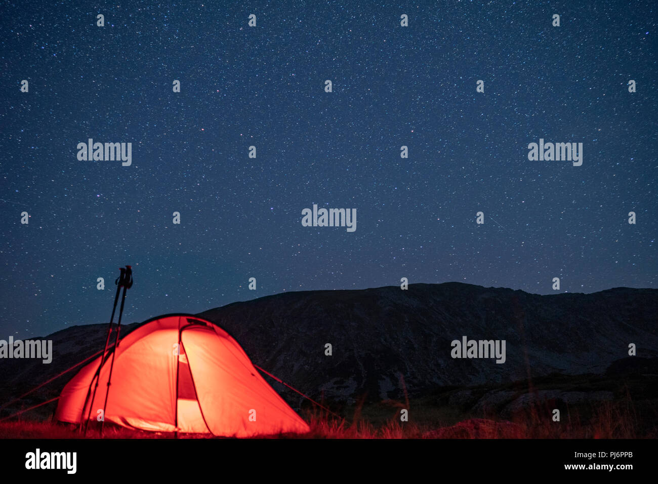 Hikers enthusiasts reach Parangul Mare, 2519m altitude, during a 3 days ...