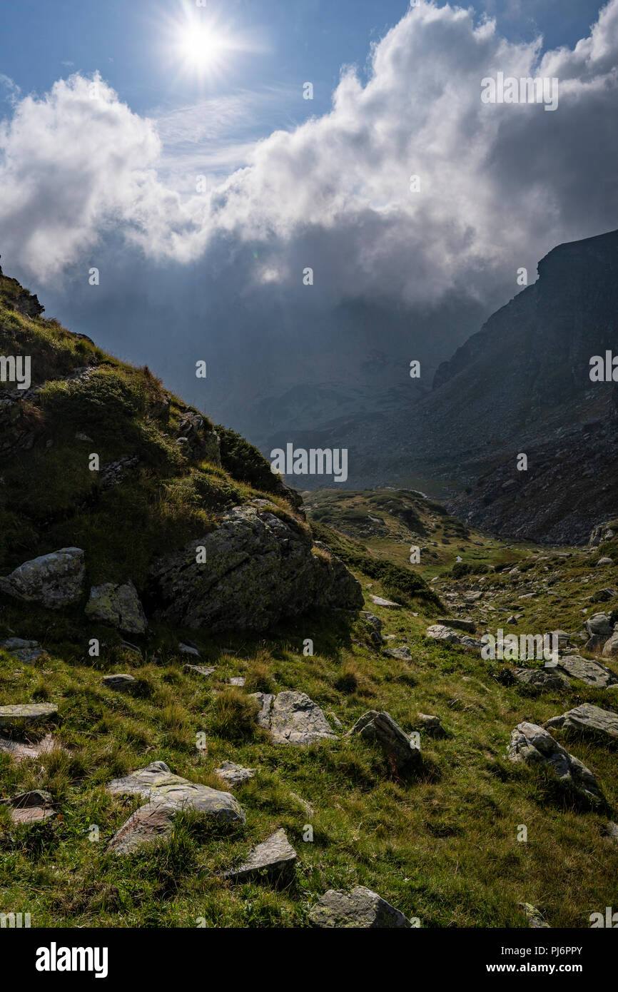 Hikers enthusiasts reach Parangul Mare, 2519m altitude, during a 3 days ...
