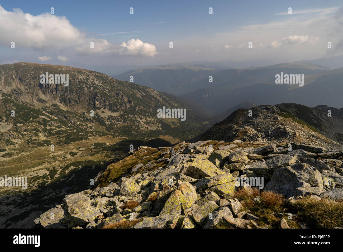Hikers enthusiasts reach Parangul Mare, 2519m altitude, during a 3 days ...