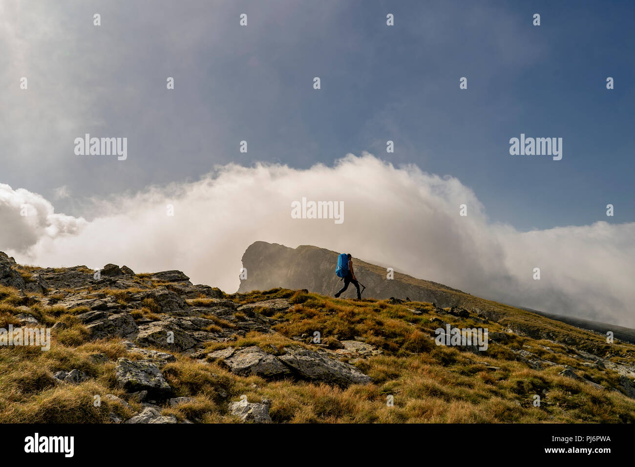 Hikers enthusiasts reach Parangul Mare, 2519m altitude, during a 3 days ...