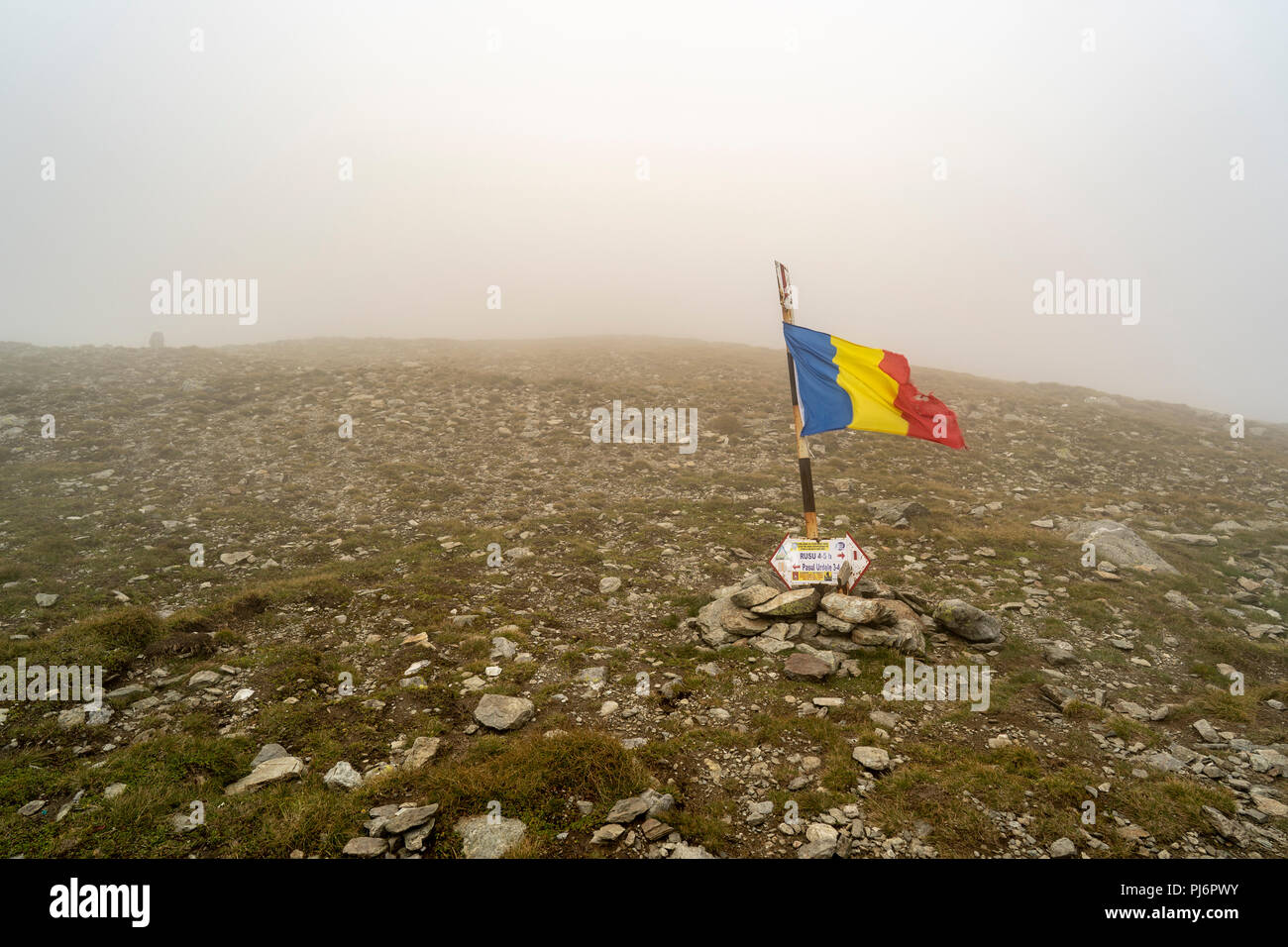 Hikers enthusiasts reach Parangul Mare, 2519m altitude, during a 3 days ...