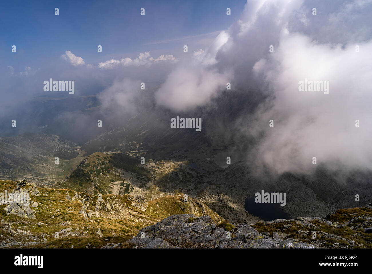 Hikers enthusiasts reach Parangul Mare, 2519m altitude, during a 3 days ...