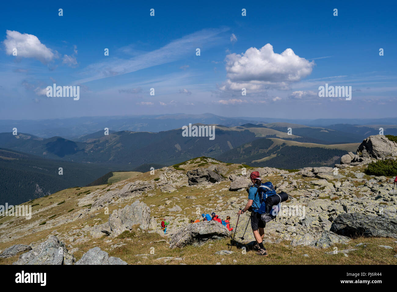 Hikers enthusiasts reach Parangul Mare, 2519m altitude, during a 3 days ...