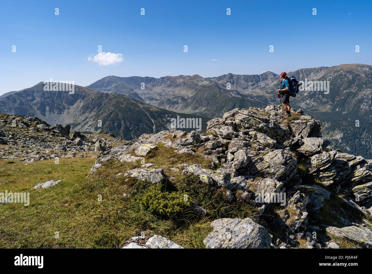 Hikers enthusiasts reach Parangul Mare, 2519m altitude, during a 3 days ...