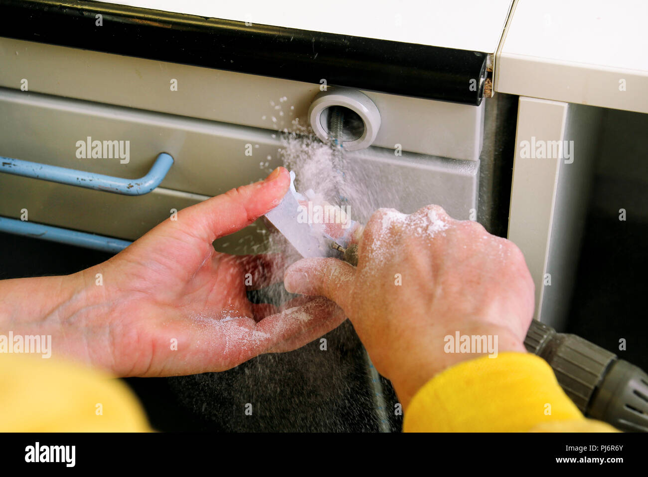 Detaching a dental prosthesis form a plaster model. Dental prosthesis ...